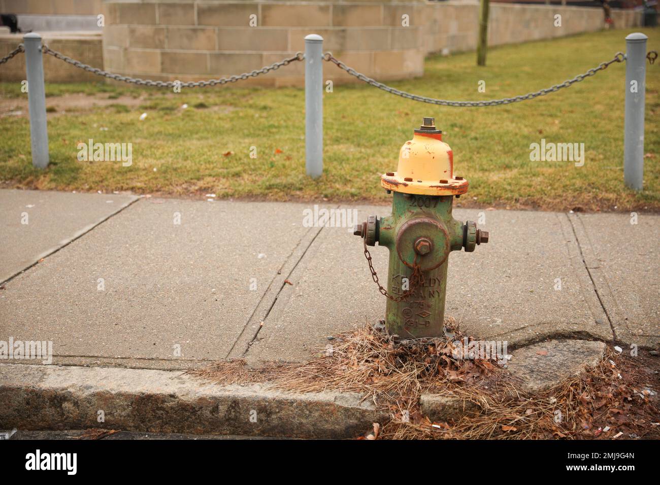 Old Fire Hydrant on the street stone cement sidewalk Stock Photo - Alamy