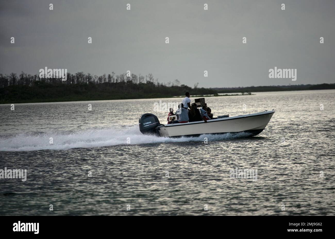 People evacuated from a nearby Cay due to the danger of floods arrive ...