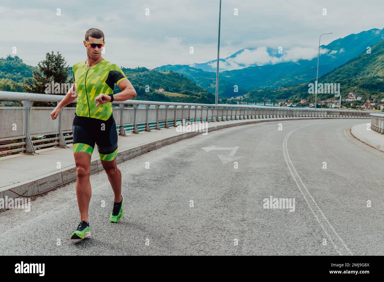An athlete running a marathon and preparing for his competition. Photo ...