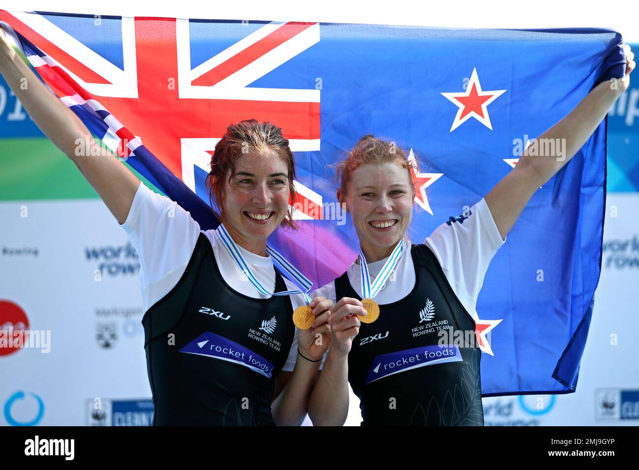 Zoe McBride, left, and Jackie Kiddle of New Zealand pose on the podium ...