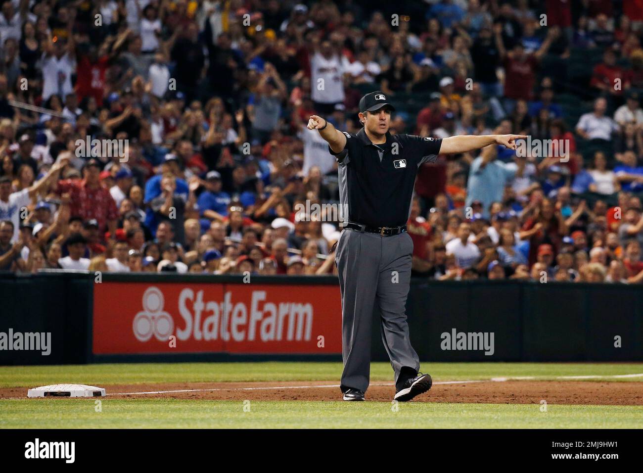 Umpire Mark Ripperger calls a balk on Los Angeles Dodgers relief ...