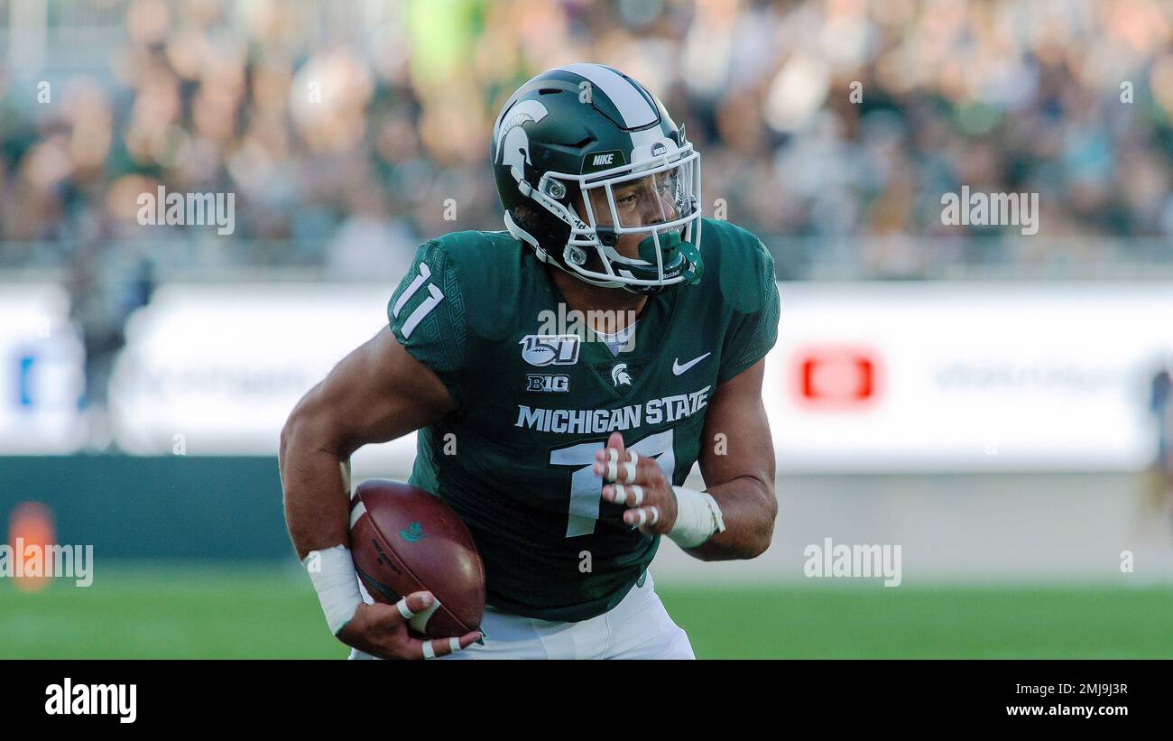Michigan State running back Connor Heyward (11) rushes during the first ...