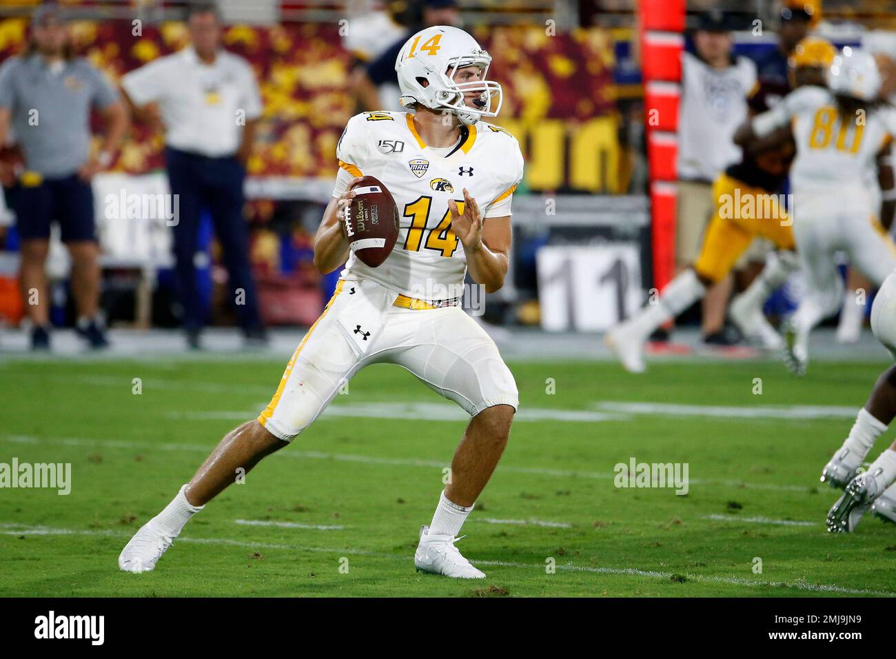 Kent State quarterback Dustin Crum (14) looks to pass the ball against ...
