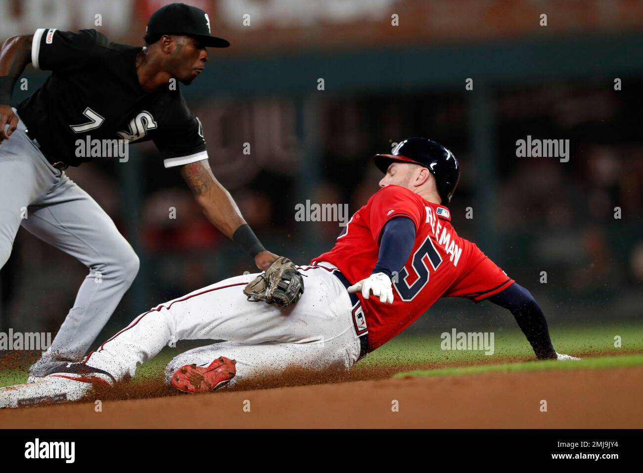 Atlanta Braves' Freddie Freeman (5) is safe at second base with a ...