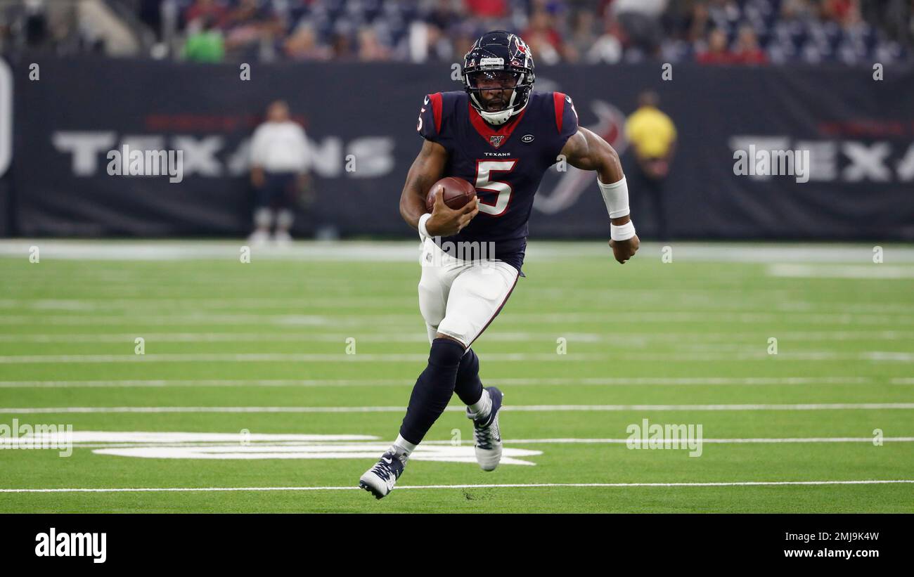 Houston Texans quarterback Joe Webb III (5) runs for a gain against the ...
