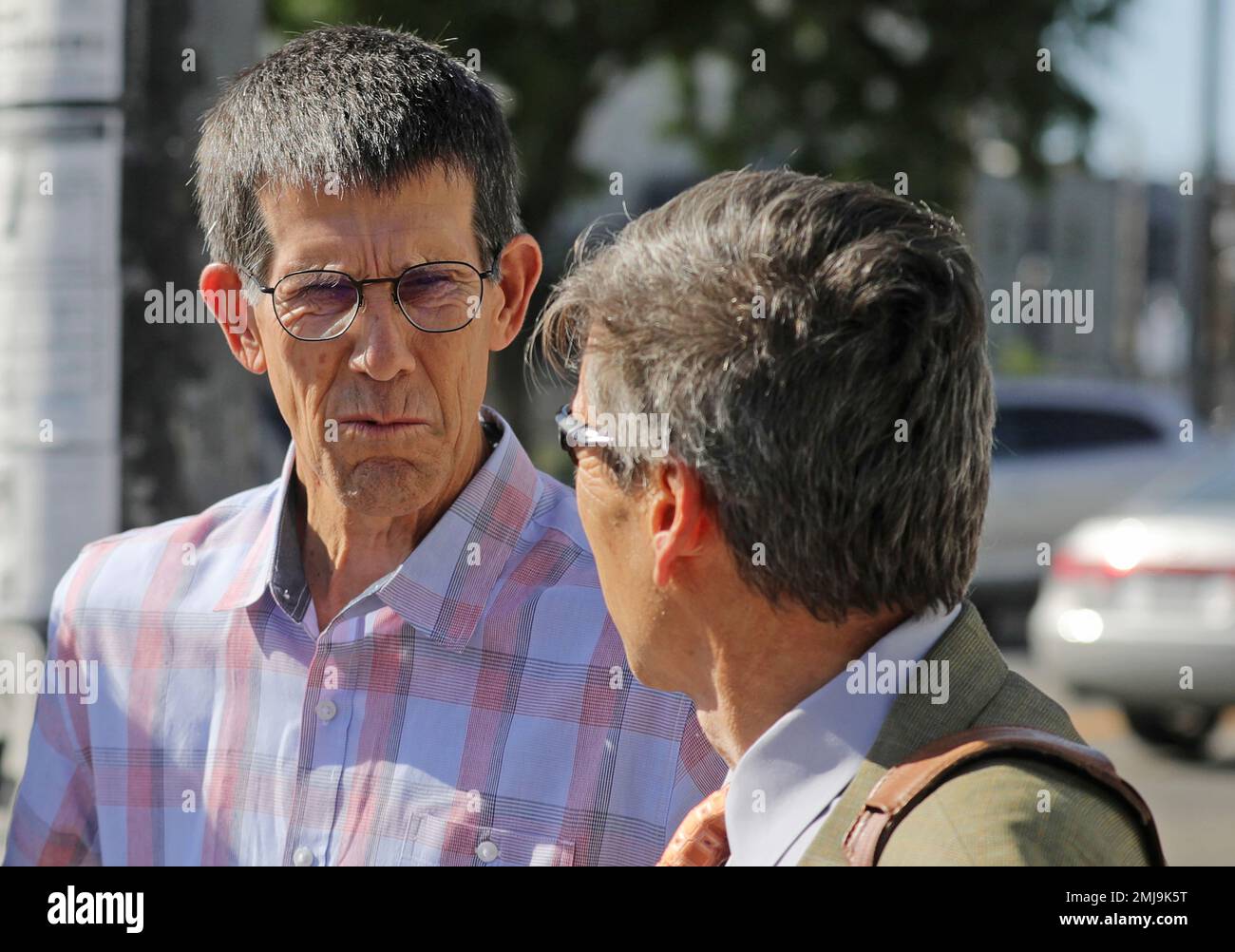Mike Shamo, the father of Aaron Shamo, talks with defense attorney Greg ...