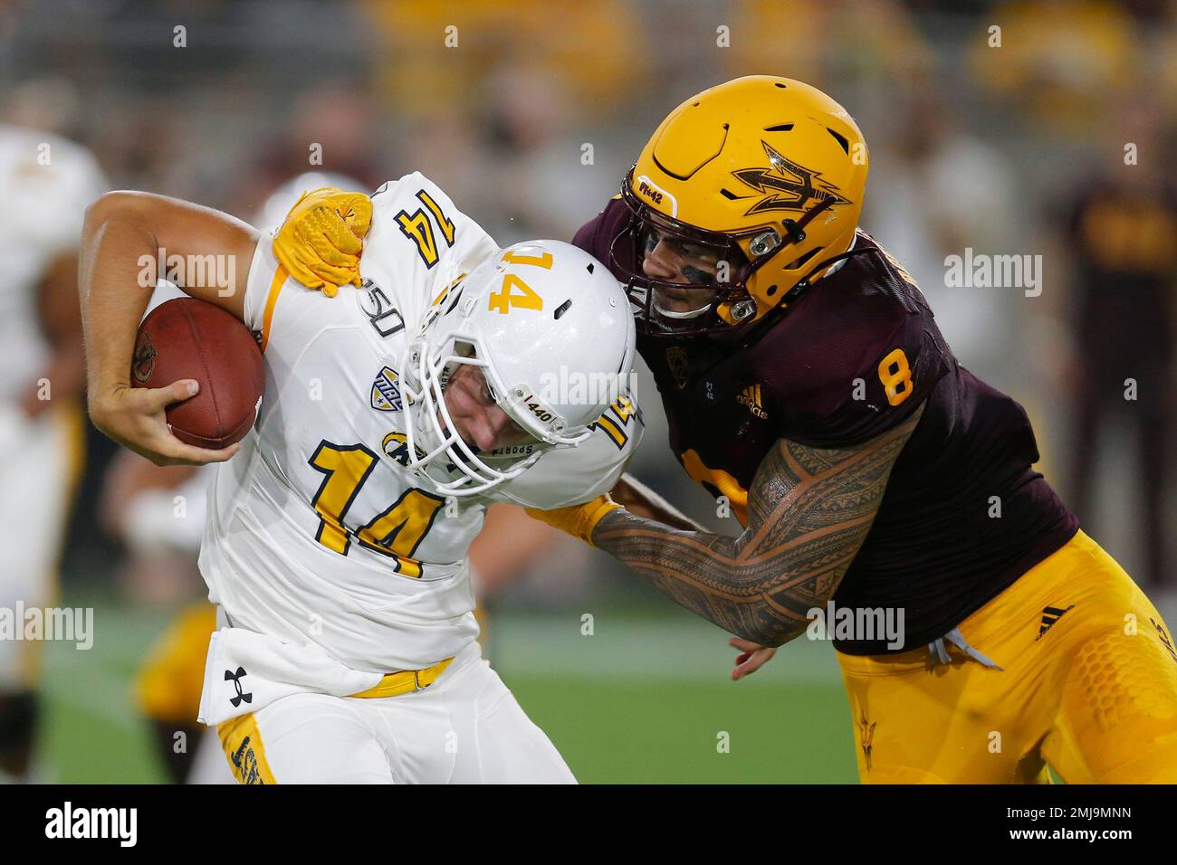 Arizona State Sun Devils linebacker Merlin Robertson (8) tackles Kent ...