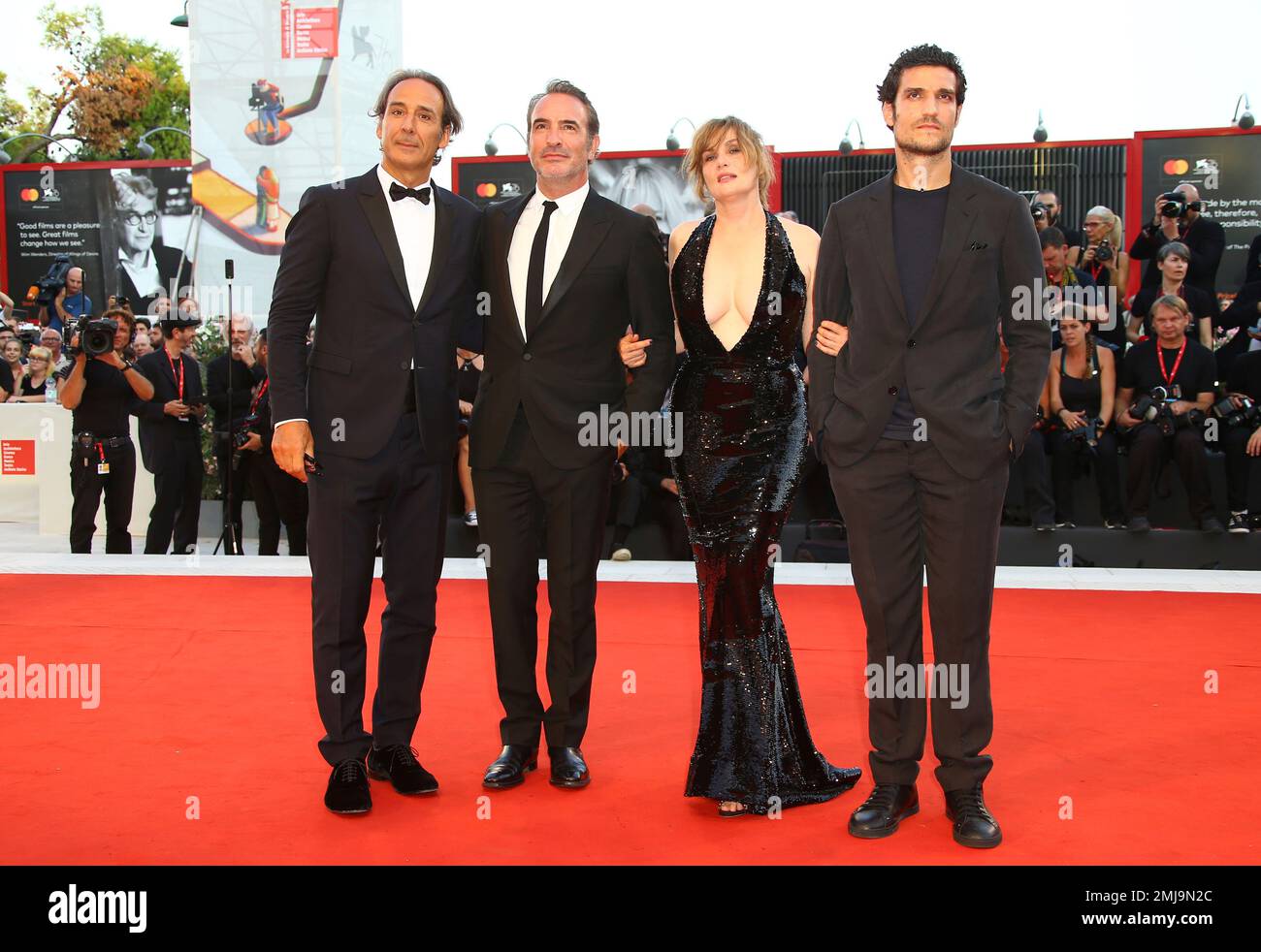Actors Louis Garrel, from right, Emmanuelle Seigner, Jean Dujardin and ...