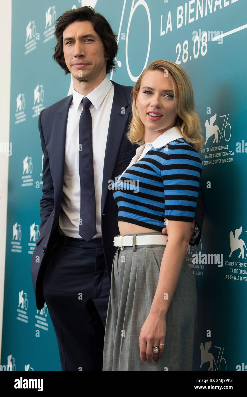 Actors Scarlett Johansson, right and Adam Driver pose for photographers ...