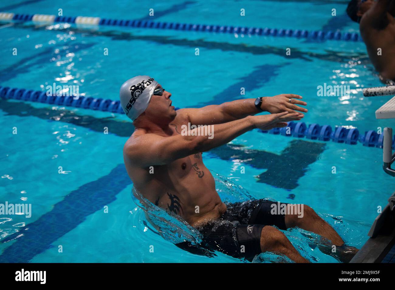 Team SOCOM competes in the swimming event at the DoD Warrior Games at ...