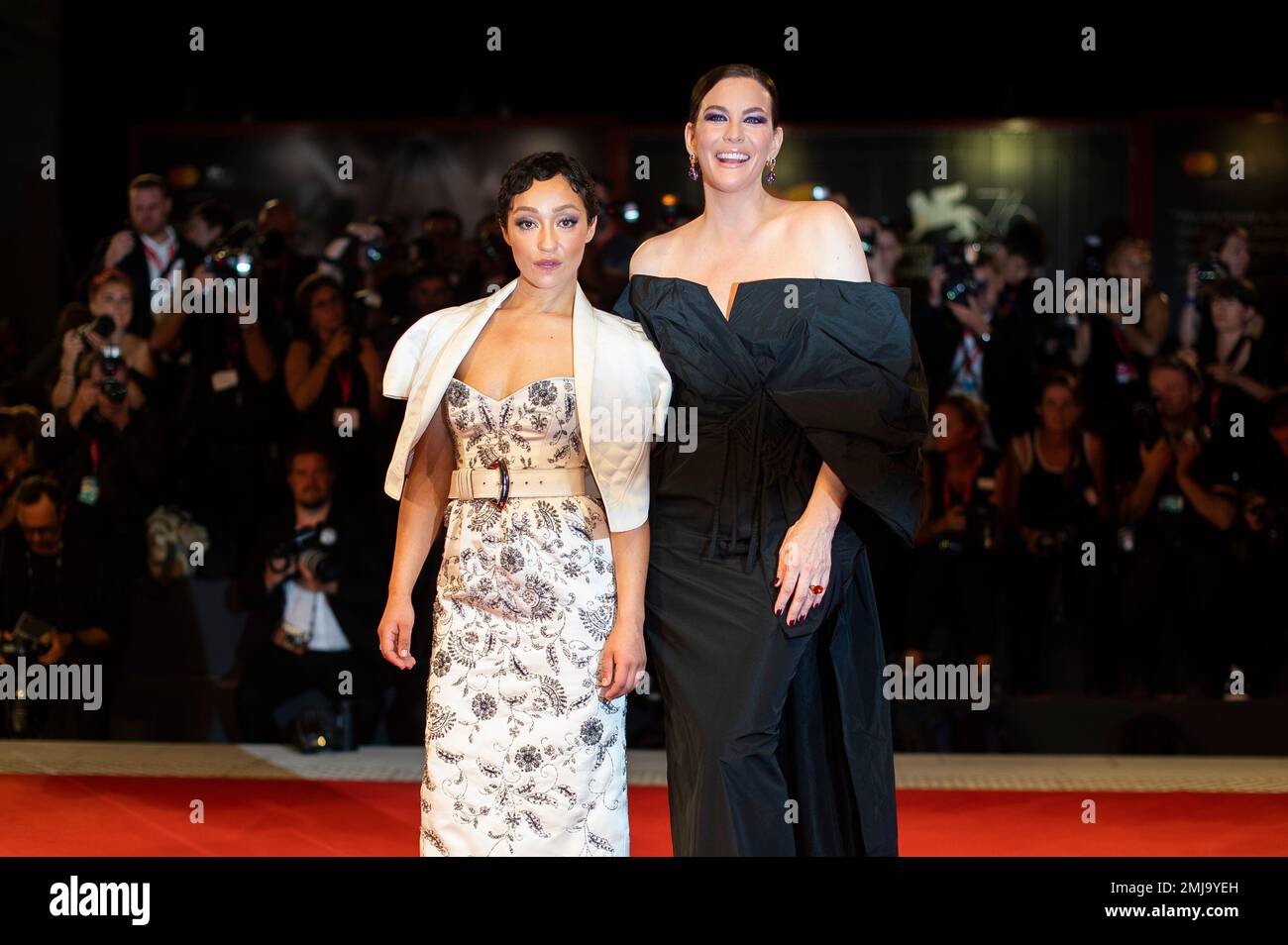 Actresses Ruth Negga, left, and Liv Tyler pose for photographers upon ...