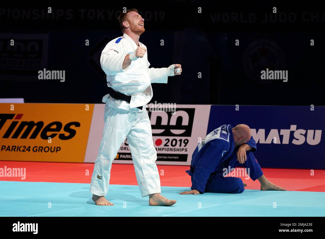 France's Axel Clerget, left, celebrates after beating Sweden's Marcus ...