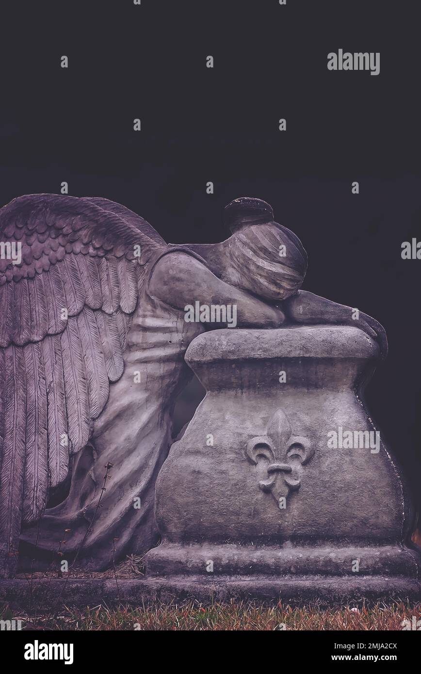 A weeping angel is pictured in St. Rose of Lima Cemetery, Jan. 1, 2023 ...