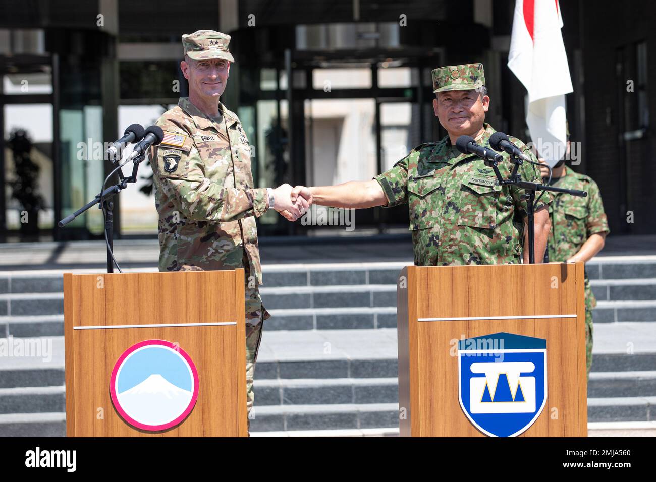 The Commanding General of U.S. Army Japan, Maj. Gen. J.B. Vowell, left ...