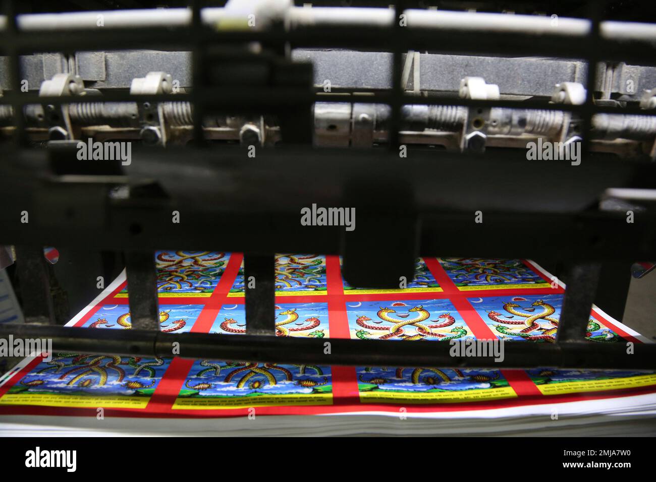 In this Aug. 2, 2019, photo, machine printed posters get ready ahead of ...