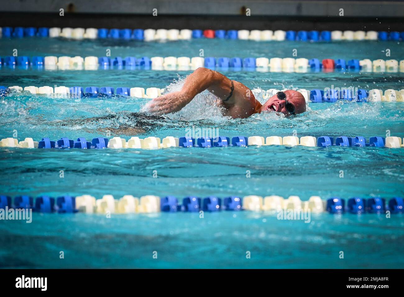 U.S. Marine Corps 1st Sgt. Ronnie Mills, Competes in swimming, during ...