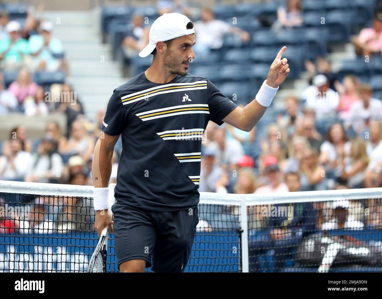 Thomas Fabbiano, of Italy, motions between serves during the first ...