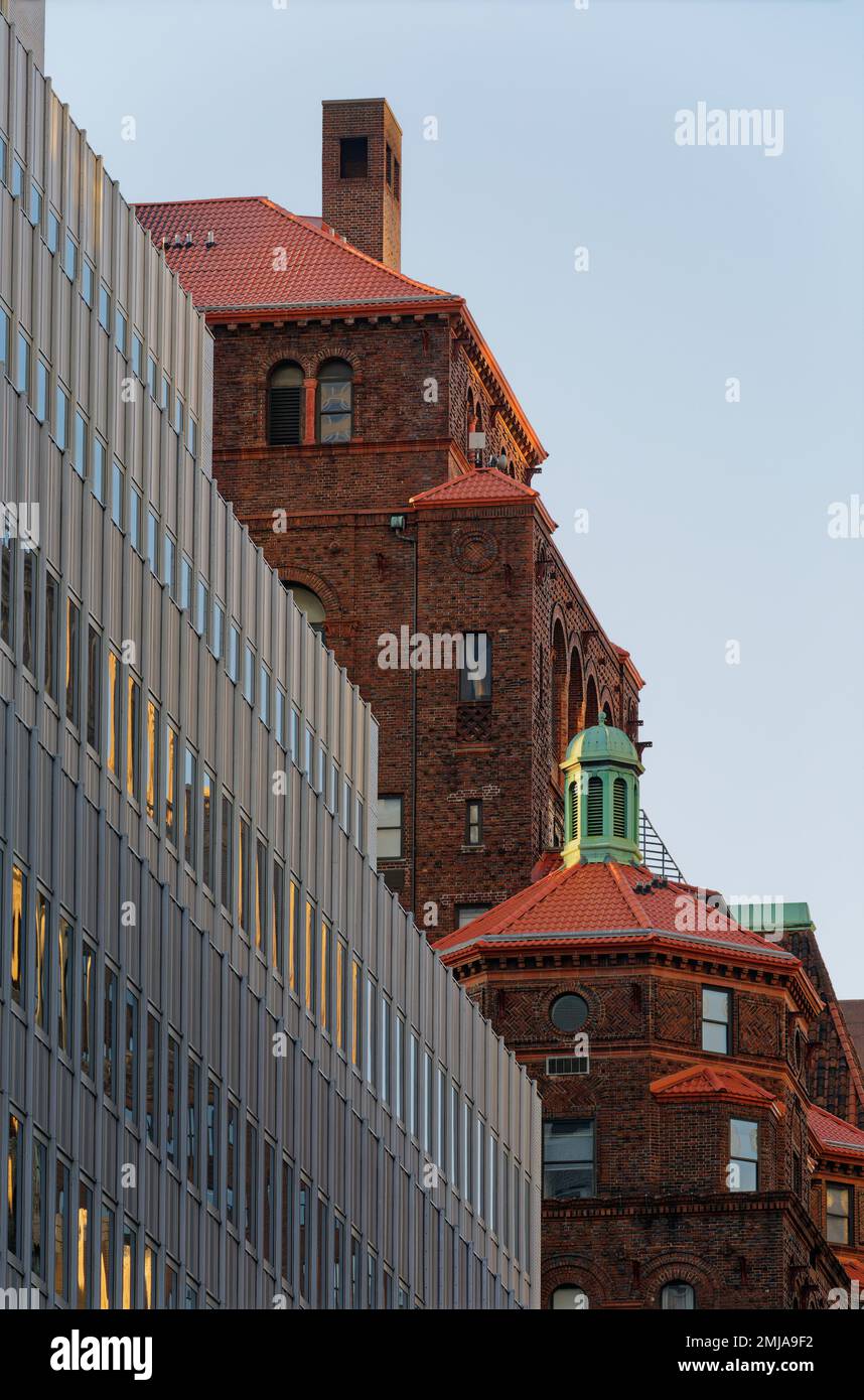 The rich polychrome masonry, red tile and copper-topped cupolas of NH ...