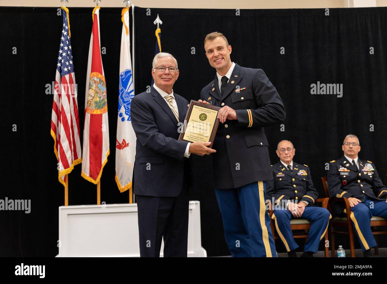 Officer Candidate Jury Paulson, receives the Physical Fitness Award ...