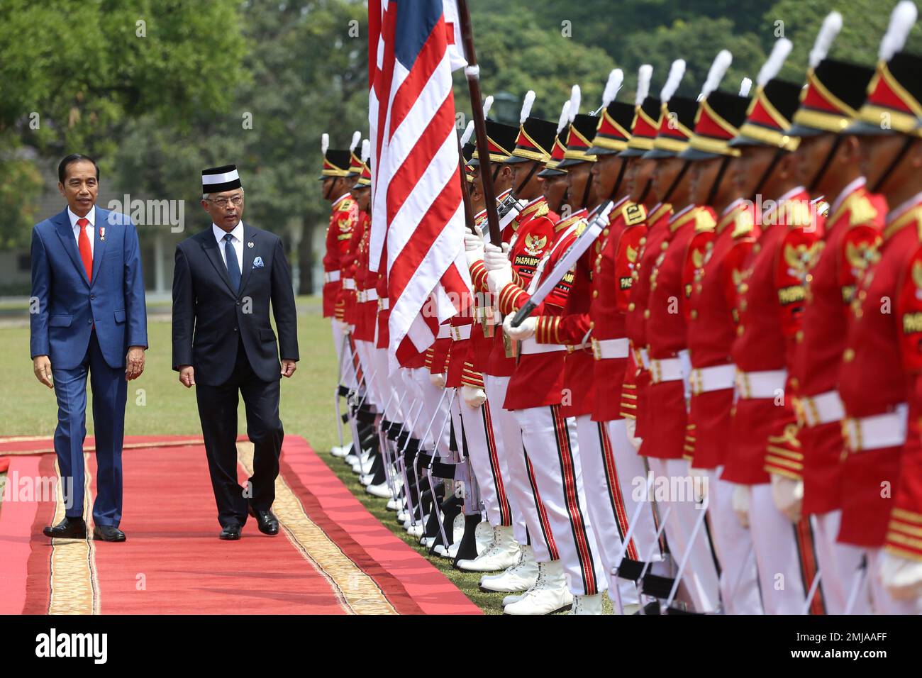 Malaysia's King Sultan Abdullah Sultan Ahmad Shah, second from left ...