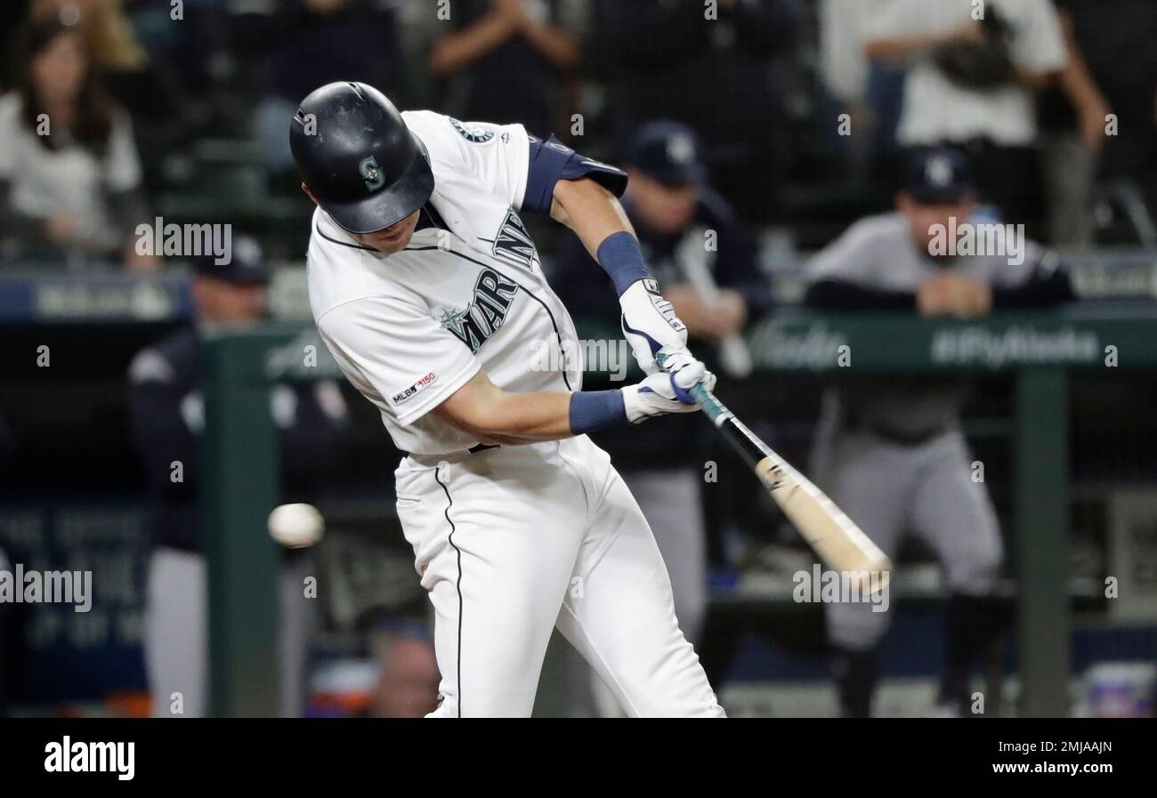 Seattle Mariners' Dylan Moore swings and misses against the New York ...