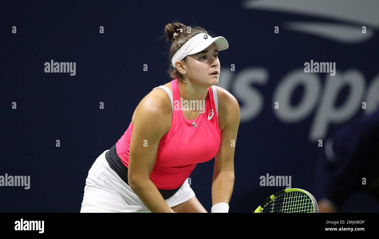 Caroline Dolehide, of the United States, prepares to return a serve ...