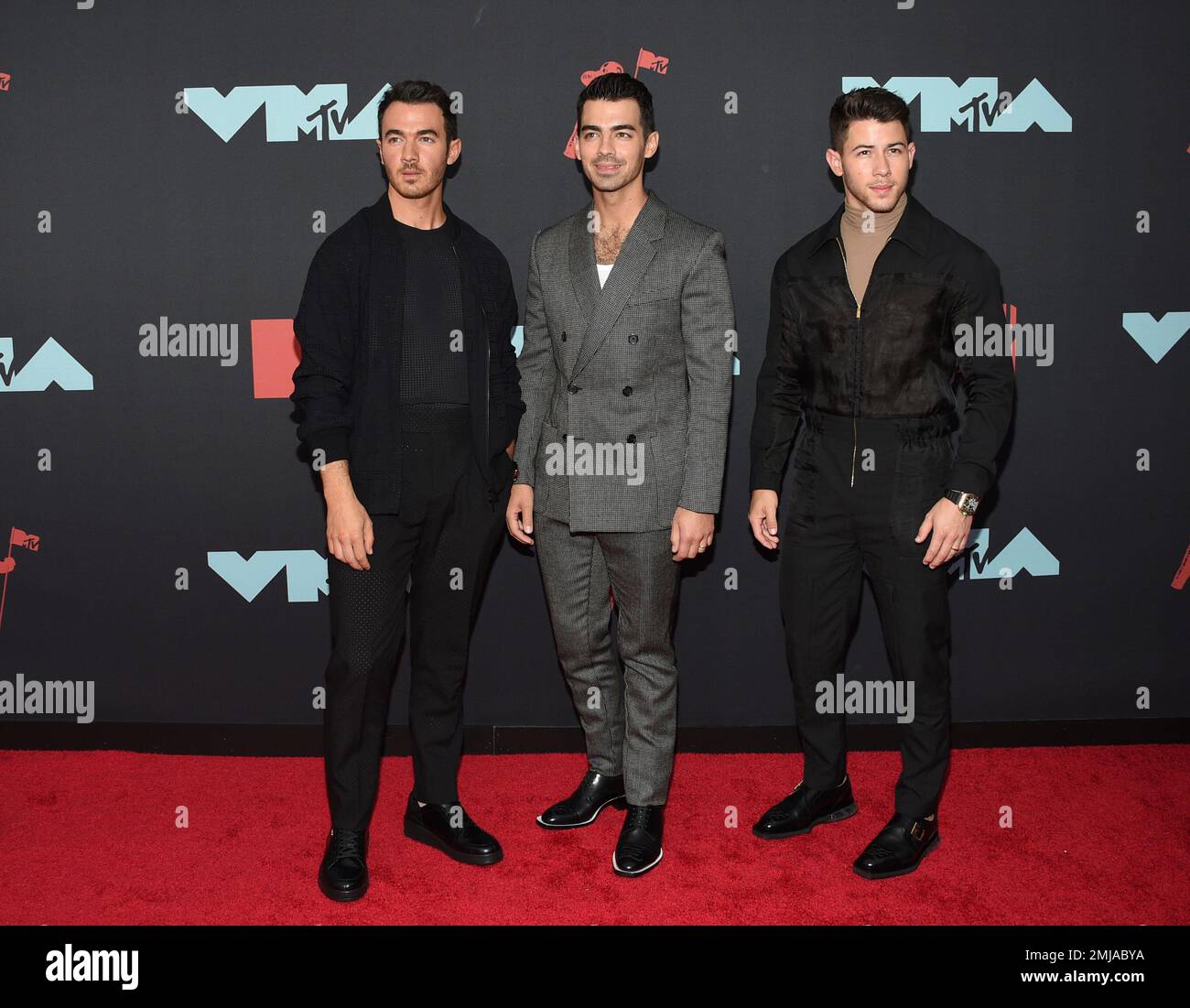 Kevin Jonas, from left, Joe Jonas, and Nick Jonas of The Jonas Brothers ...