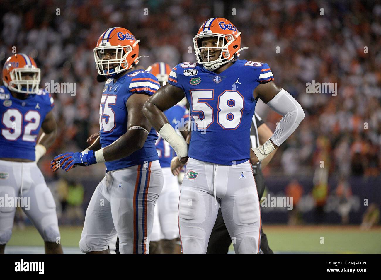 Florida defensive lineman Jabari Zuniga (92), defensive lineman Kyree ...