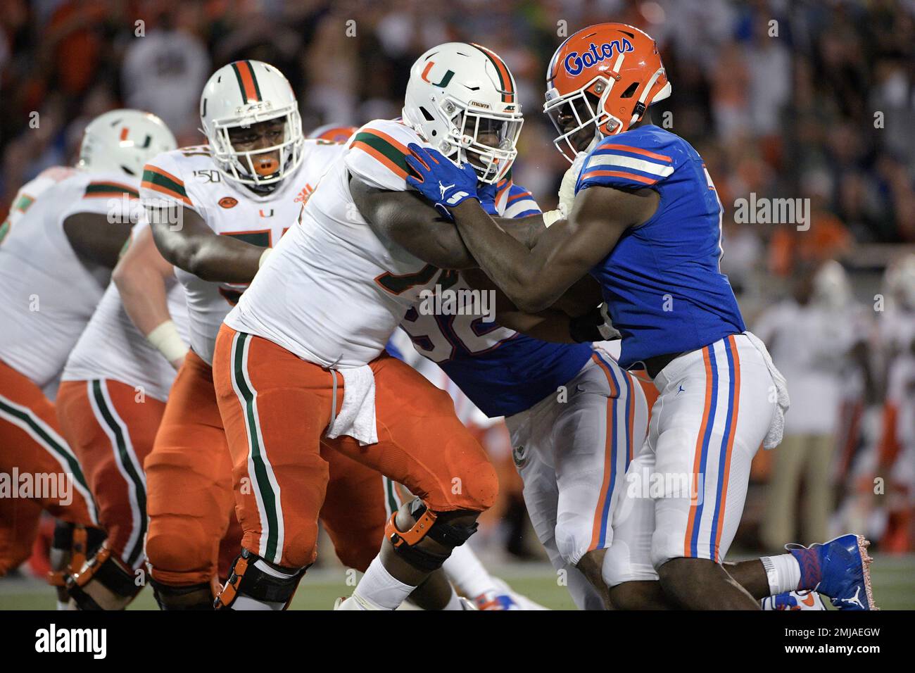 Miami offensive lineman John Campbell Jr. (74) blocks against Florida ...