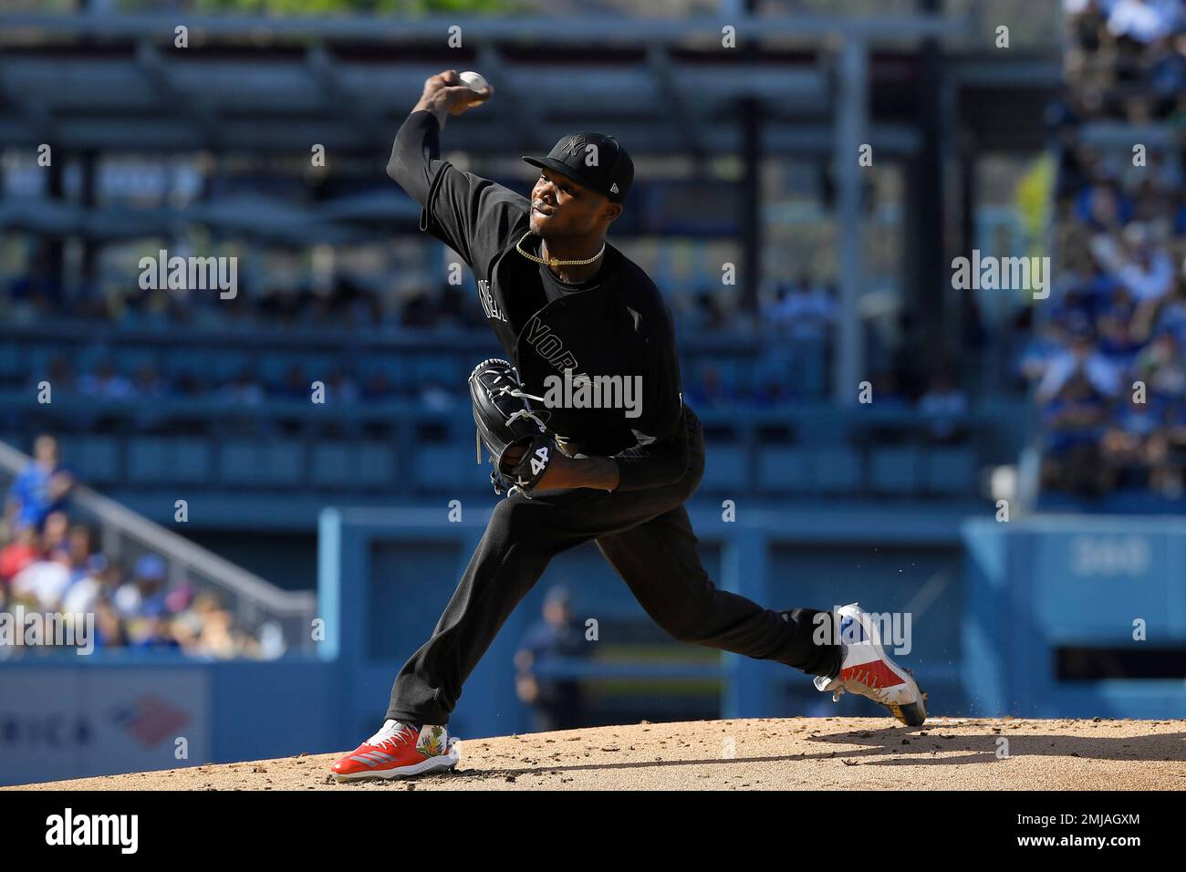 New York Yankees starting pitcher Domingo German throws to the plate ...