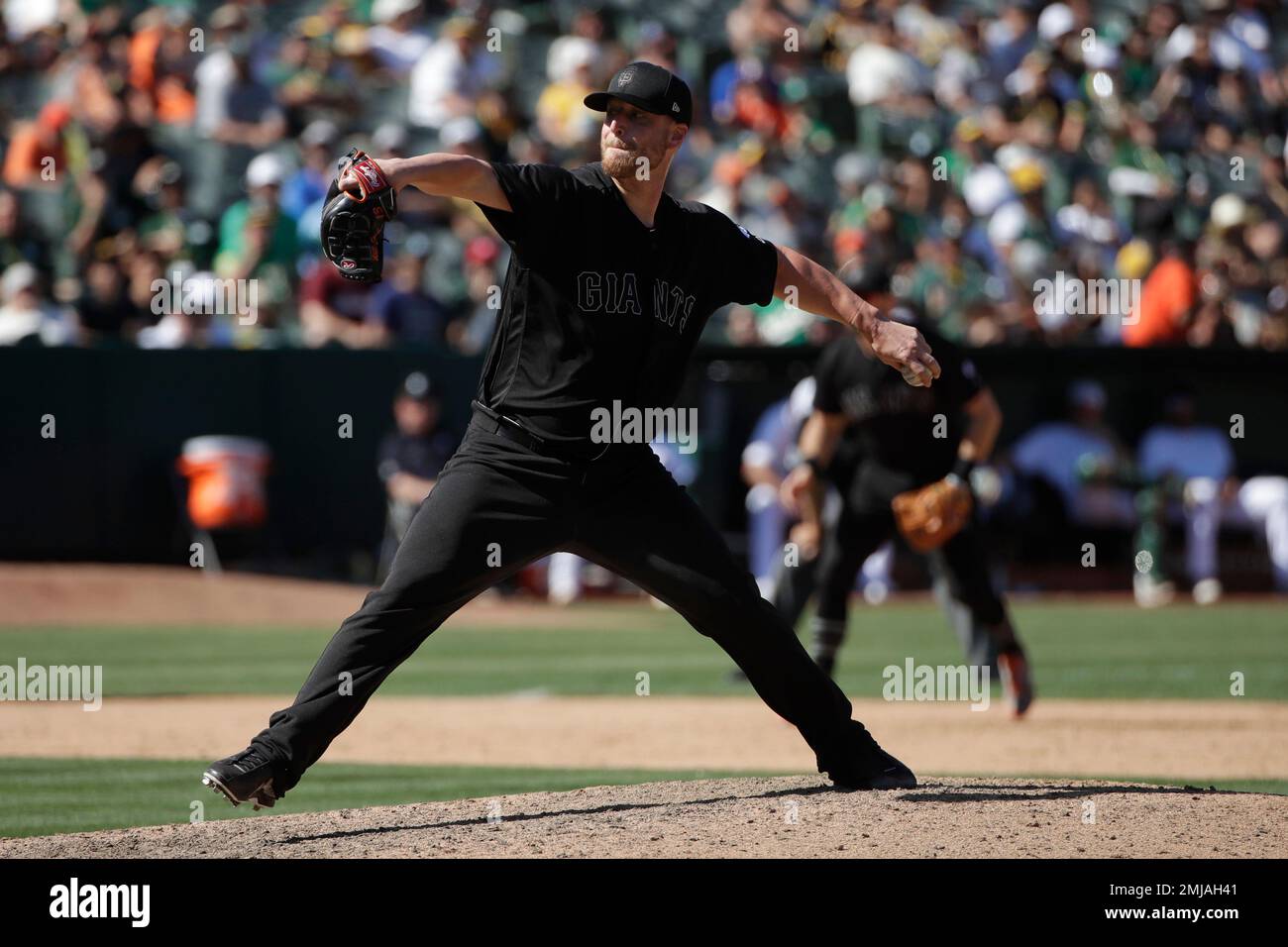 San Francisco Giants pitcher Will Smith throws against the Oakland ...