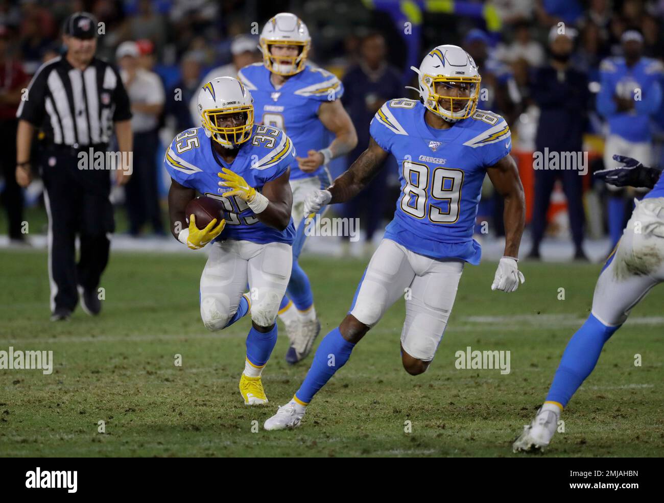 Los Angeles Chargers running back Troymaine Pope (35) follows wide ...