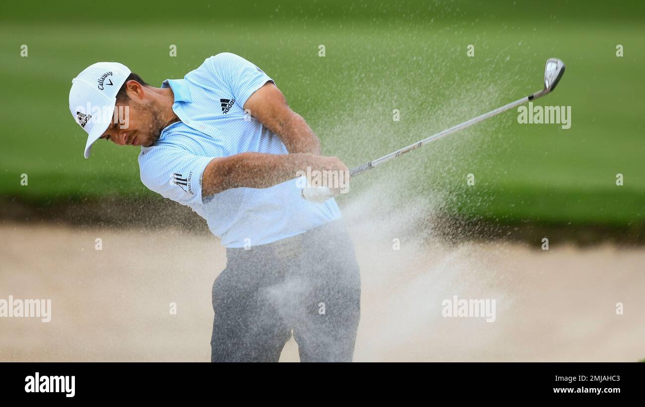 Xander Schauffele hits out of a buker on the 17th fairway during the ...