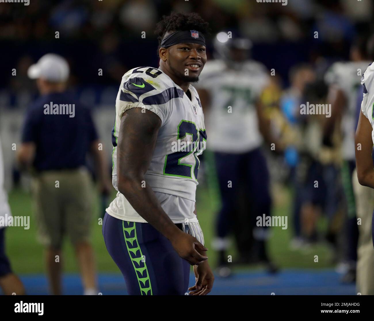 Seattle Seahawks running back Rashaad Penny (20) looks over from the ...