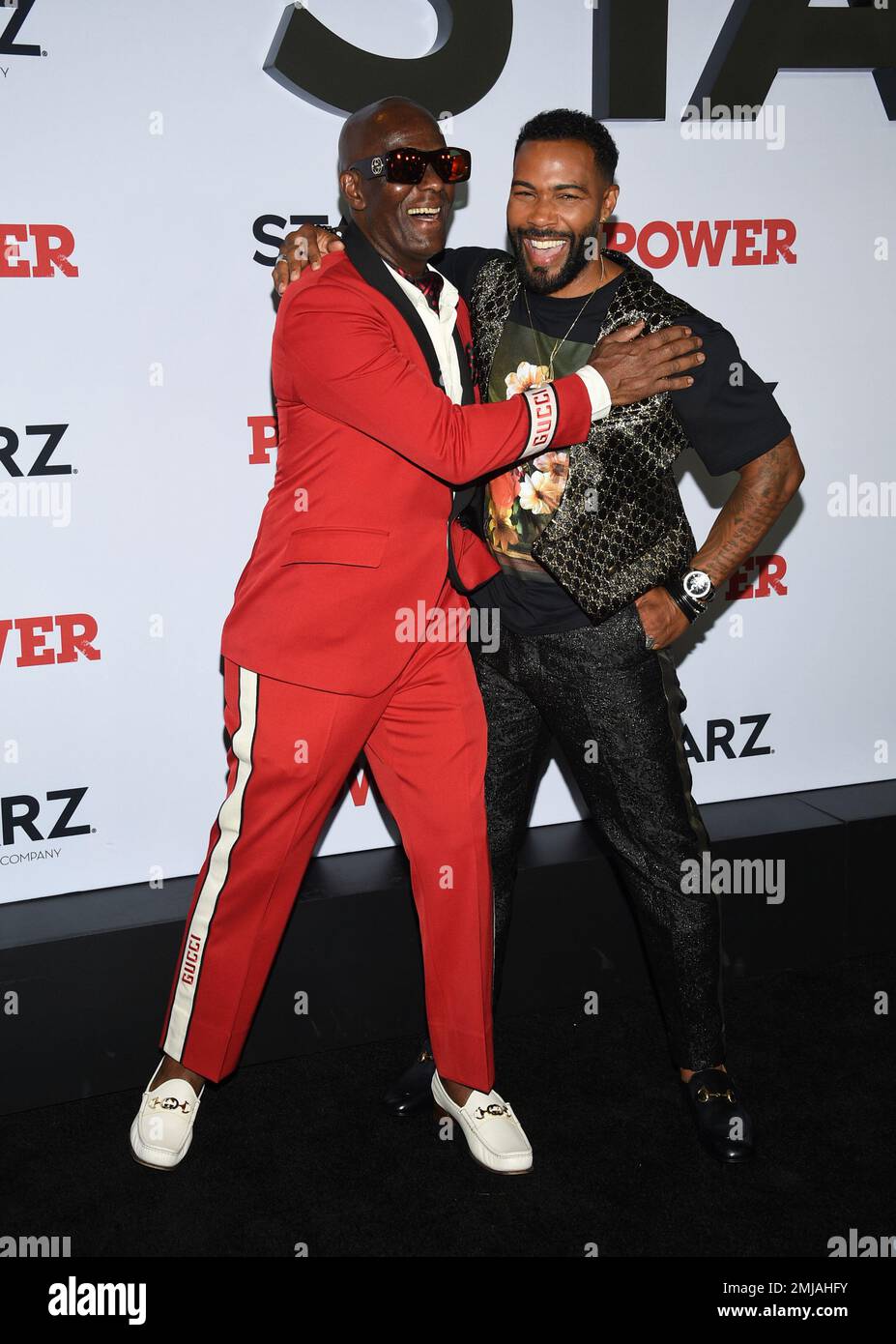 Fashion designer Dapper Dan, left, and actor Omari Hardwick pose ...