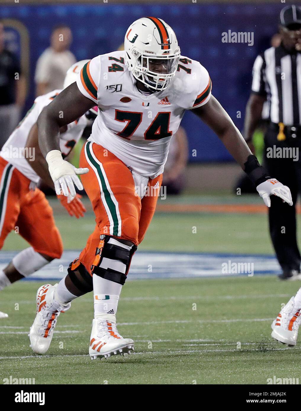 Miami offensive lineman John Campbell Jr. (74) looks to block a Florida ...
