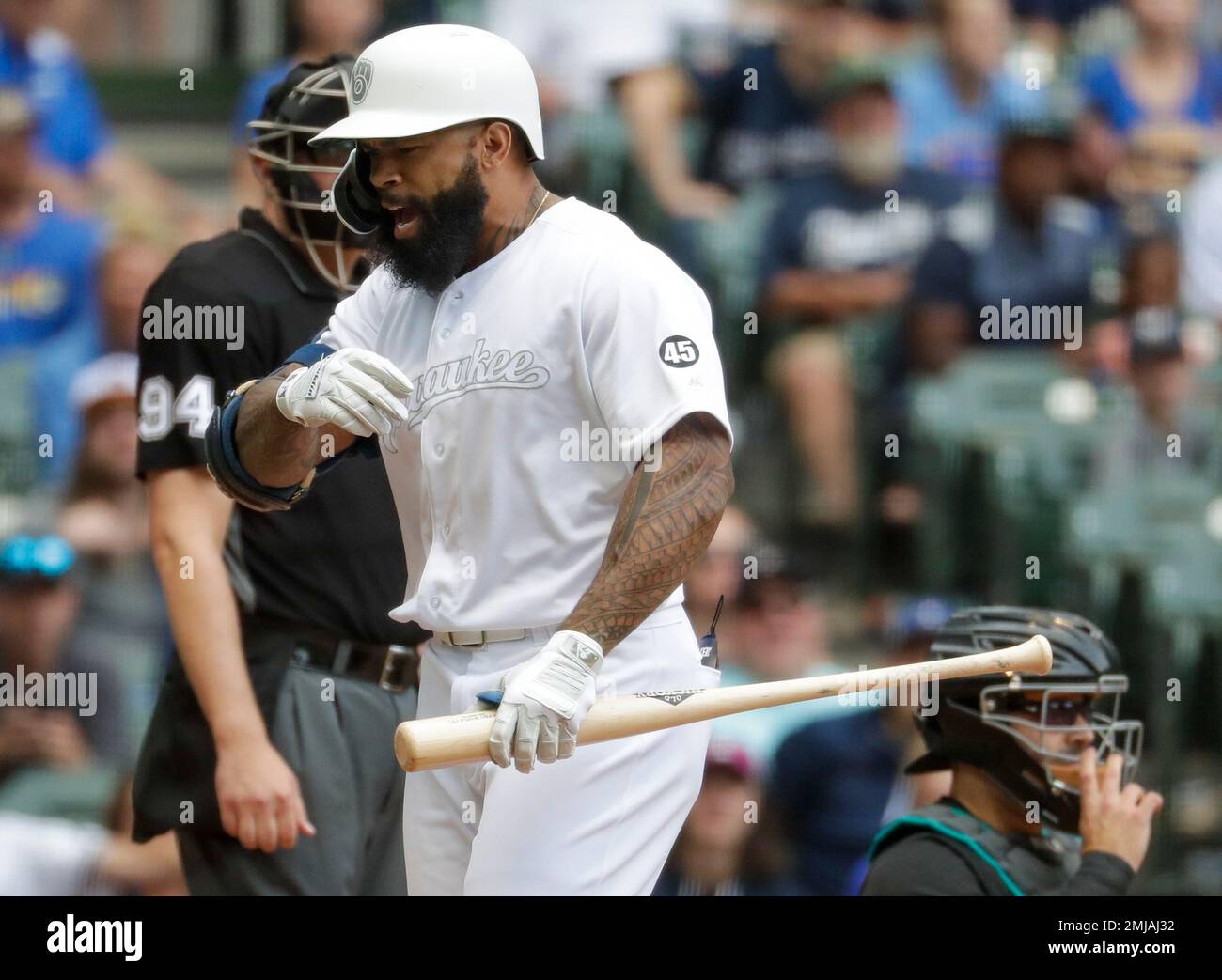 Milwaukee Brewers' Eric Thames reacts after striking out during the ...