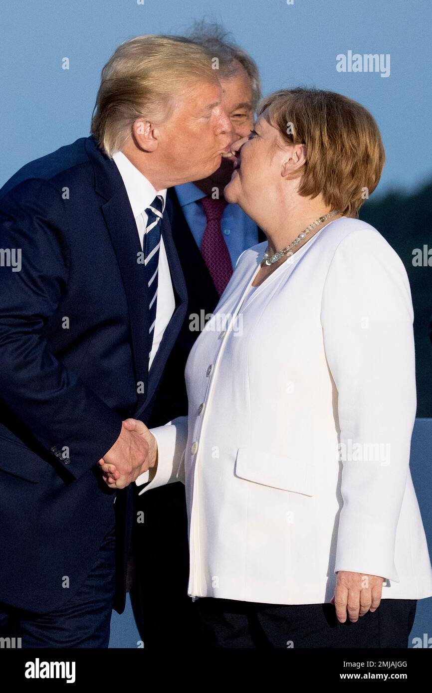 President Donald Trump, left, and German Chancellor Angela Merkel ...
