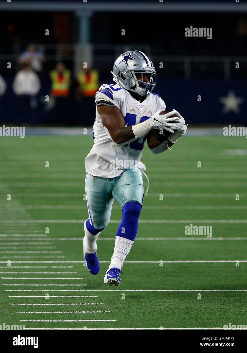 Dallas Cowboys running back Mike Weber carries the ball in the second ...