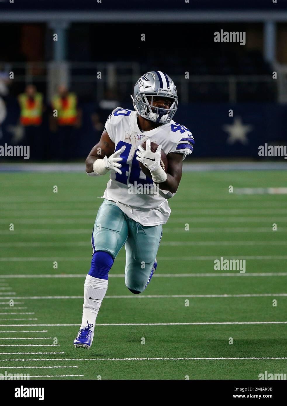 Dallas Cowboys running back Mike Weber carries the ball in the second ...