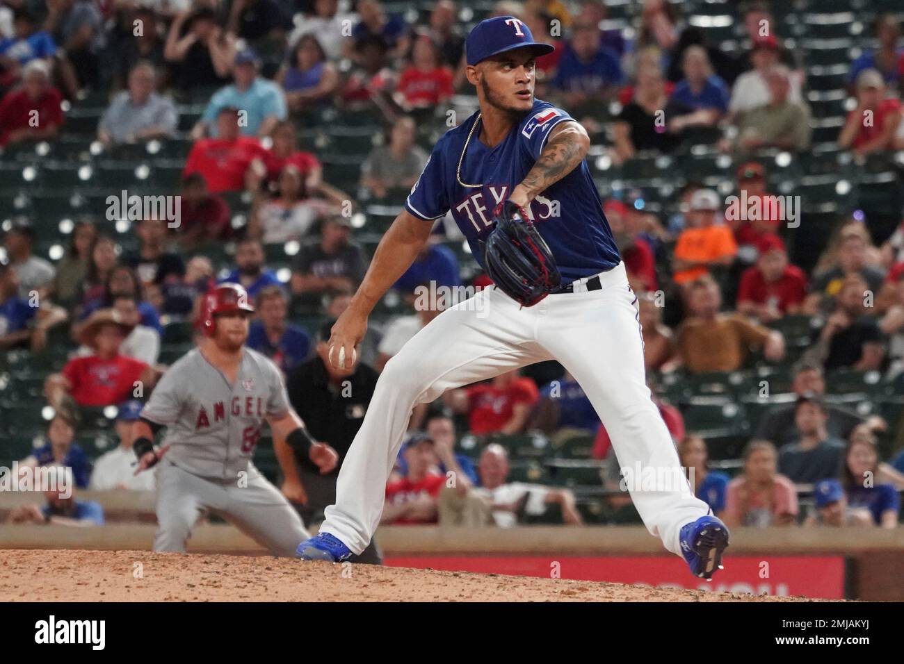 Texas Rangers relief pitcher Jonathan Hernandez pitches against the Los ...