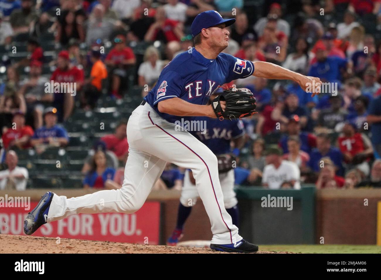 Texas Rangers relief pitcher Locke St. John pitches against the Los ...