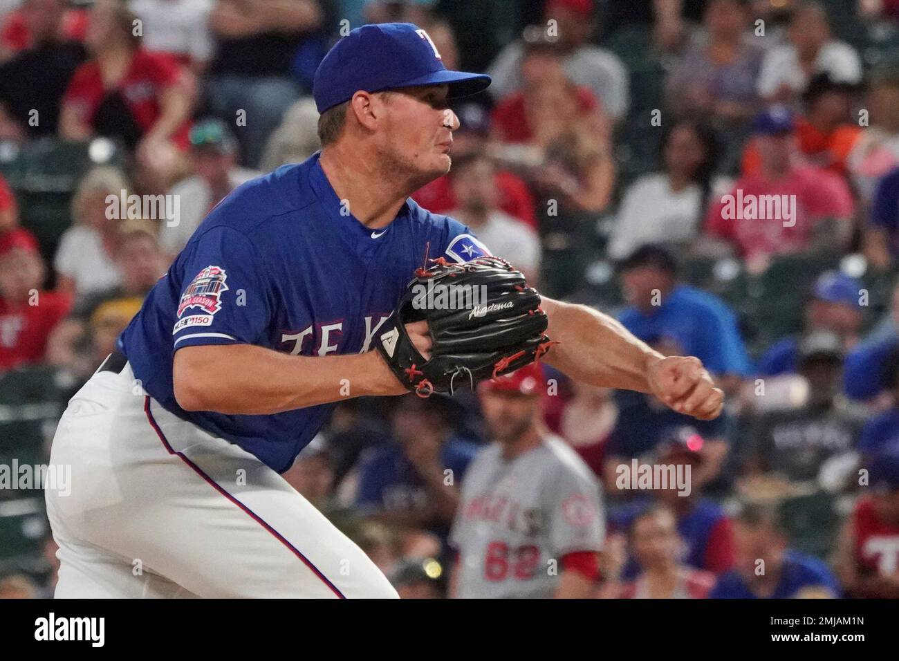 Texas Rangers relief pitcher Locke St. John pitches against the Los ...