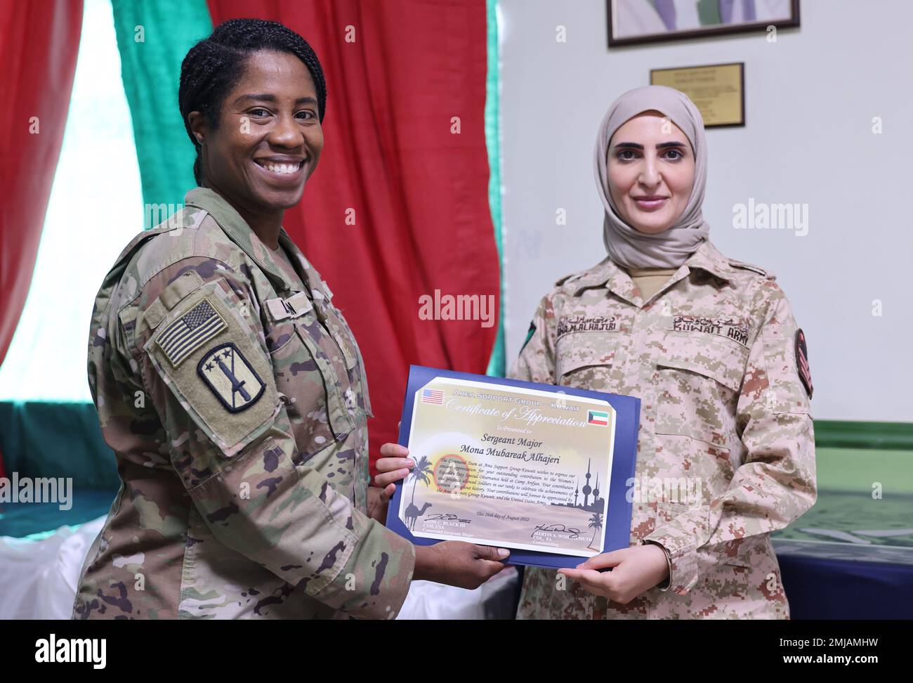 Kuwait Army doctor, Sgt. Maj. Mona Mubarak Alhajeri receives a ...