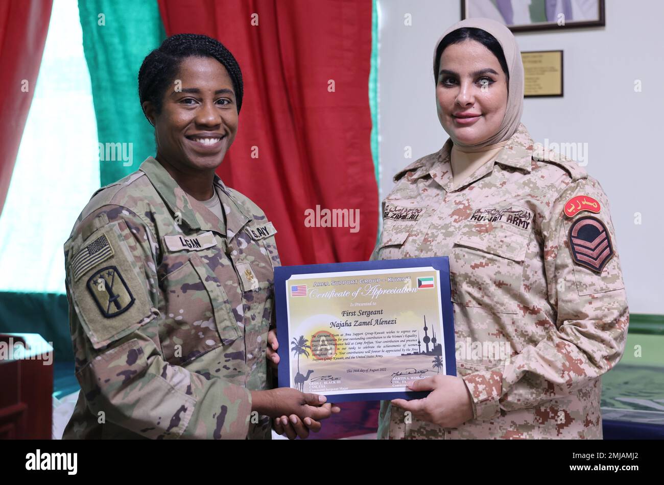 Kuwait Army doctor, Sgt. Maj. Najah Zamel Alenezi receives a ...