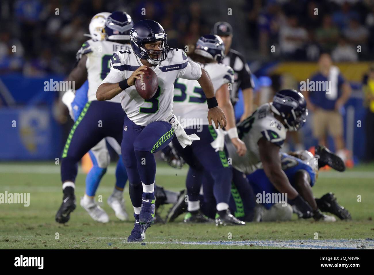 Seattle Seahawks quarterback Russell Wilson plays against the Los ...