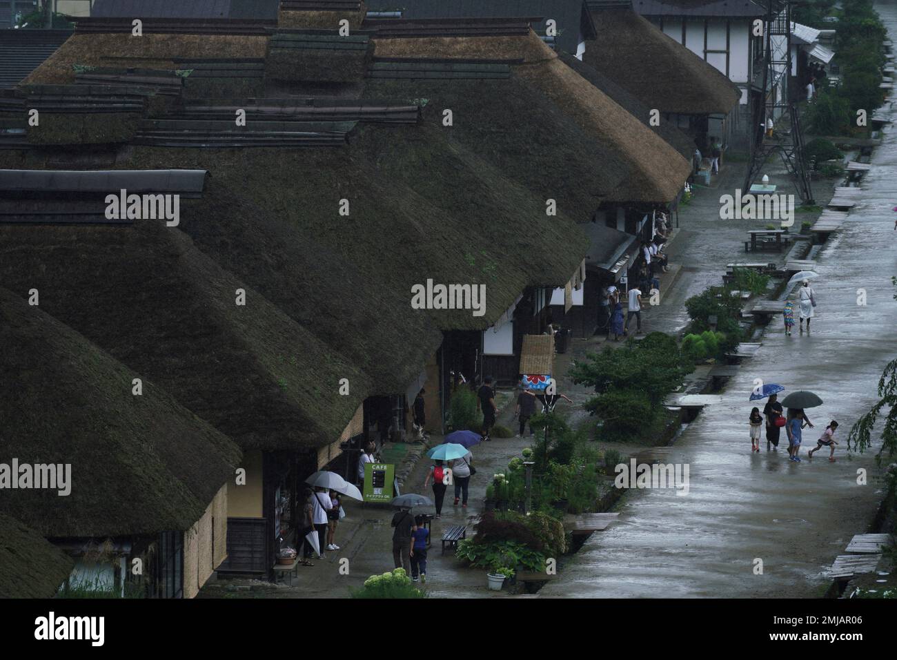 In this Aug. 21, 2019 photo, Japanese traditional thatched-roofed ...