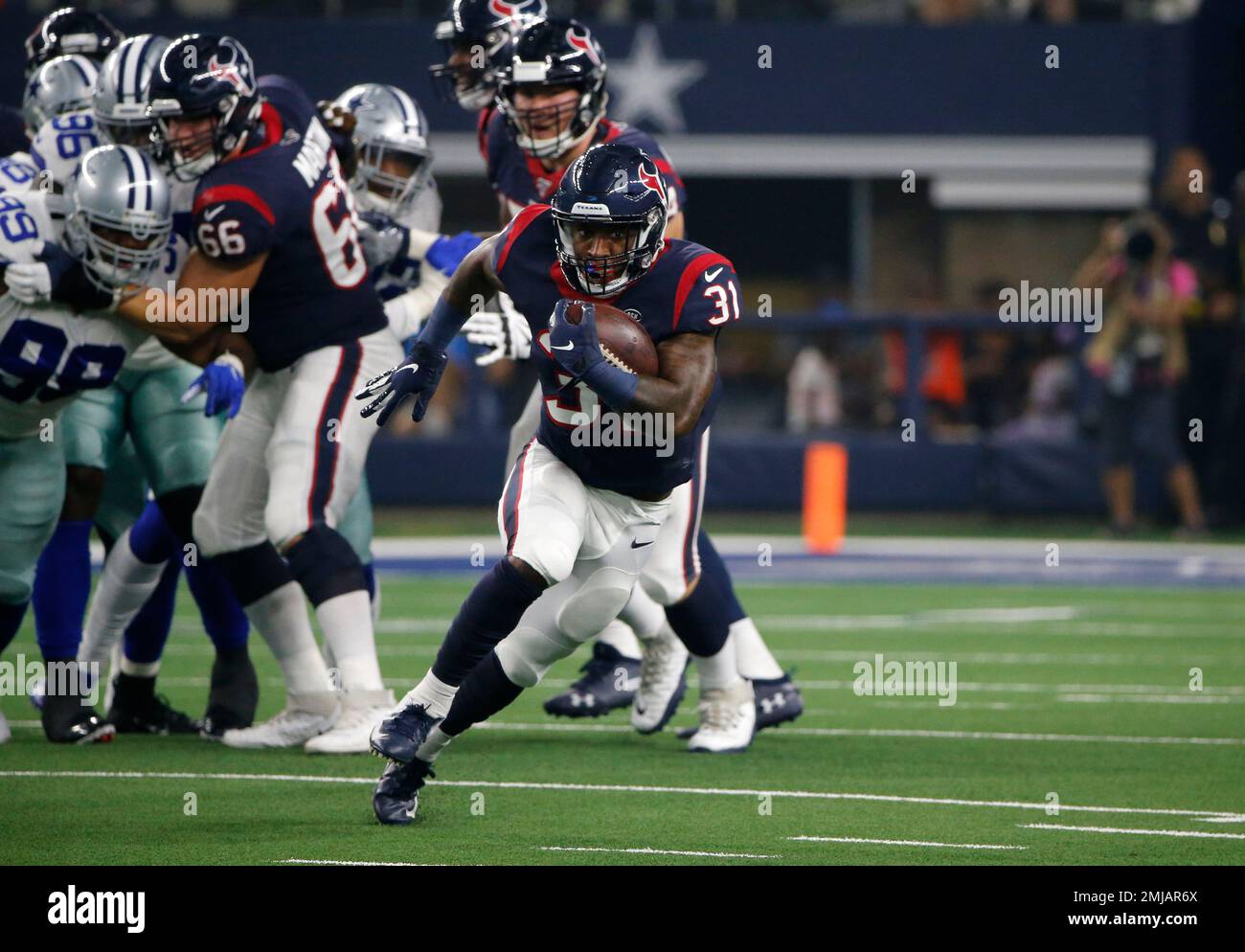 Houston Texans' Karan Higdon runs the ball against the Dallas Cowboys ...