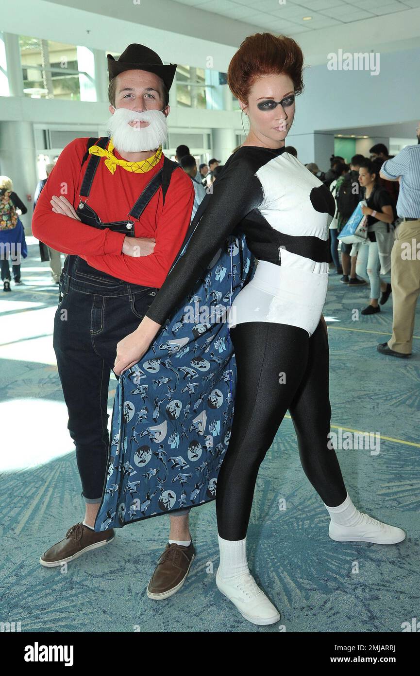 Ryan Wenzel, of Chicago, dressed as Stinky Pete, left, and Allie Ring ...