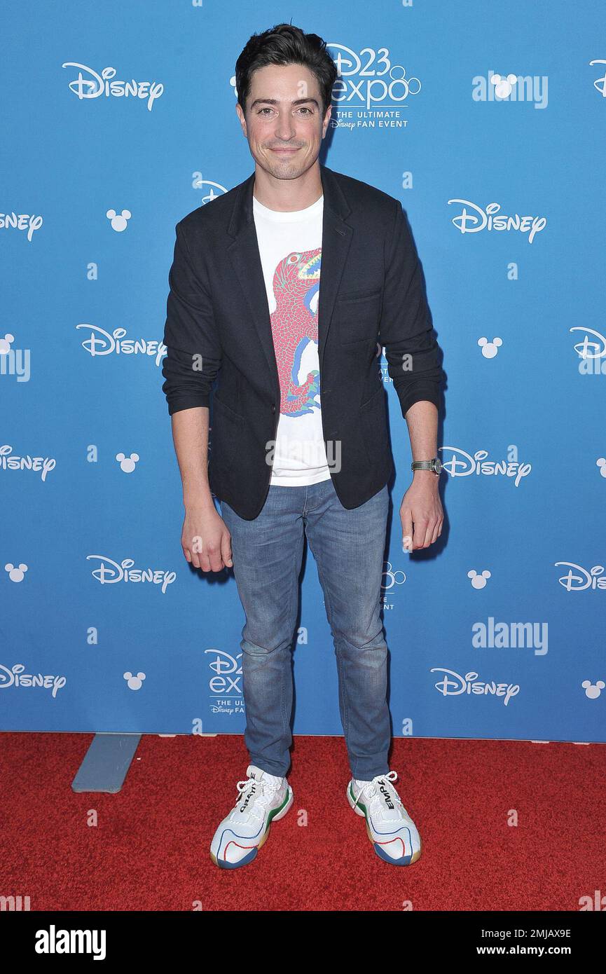 Ben Feldman attends the Disney+ press line at the 2019 D23 Expo on ...